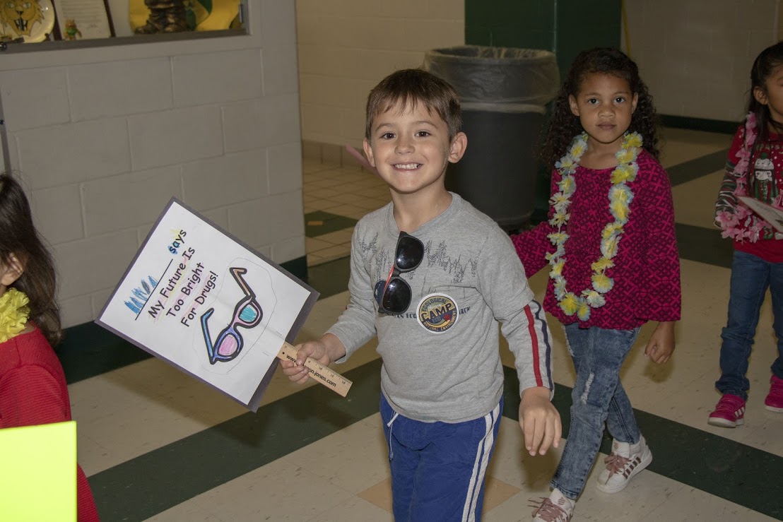 Rain Doesn’t Stop Annual Red Ribbon Parade – JoCo Report